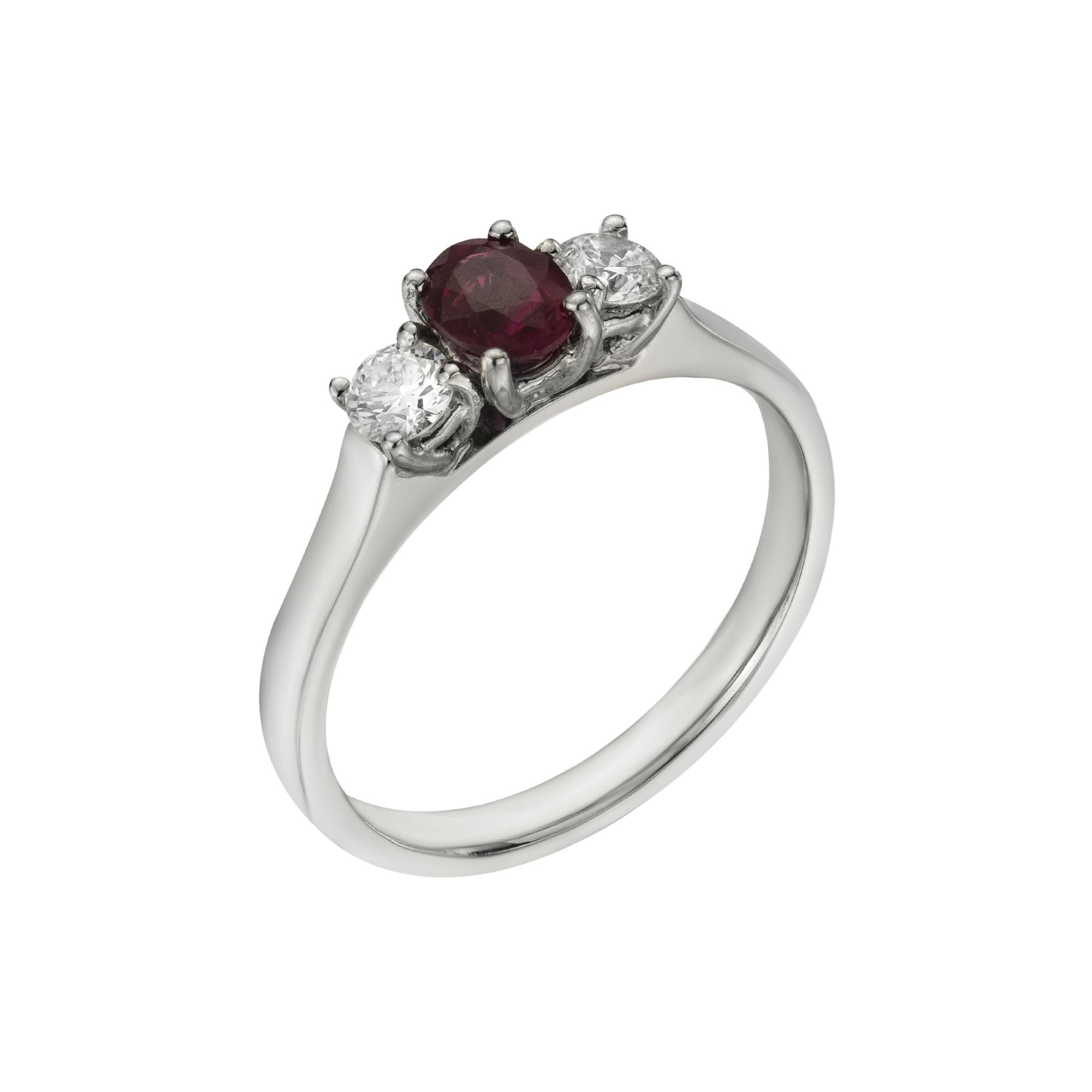 Platinum Oval Cut Ruby Three Stone Ring